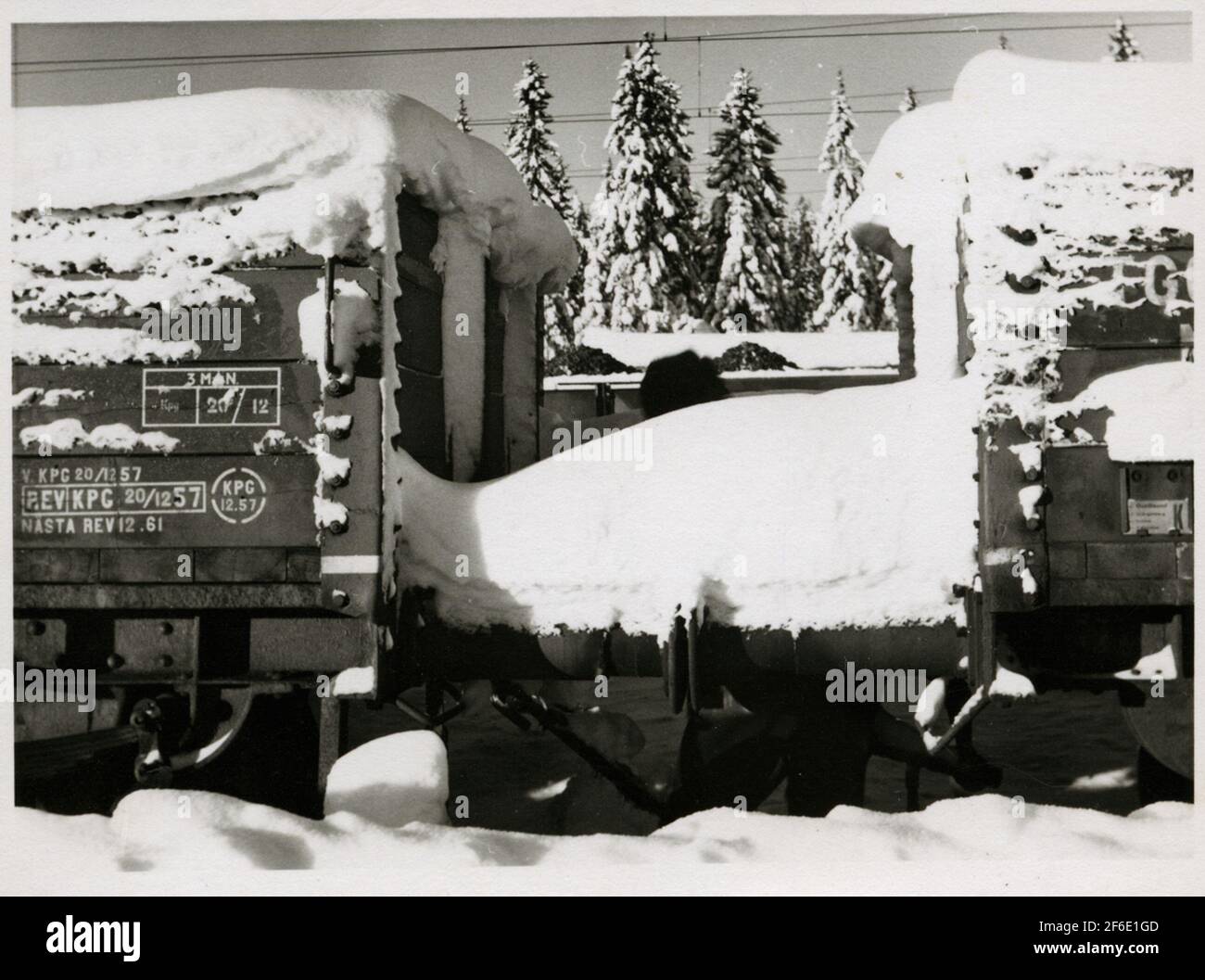 Snow-covered freight wagons Stock Photo - Alamy
