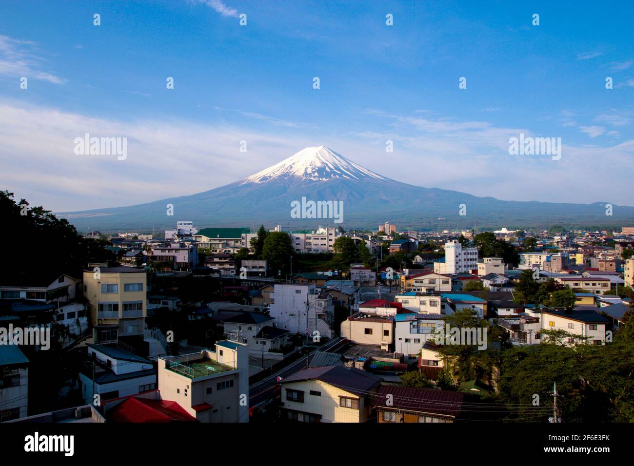 Snow capped Mount Fuji in the background of a typical Japanese ...