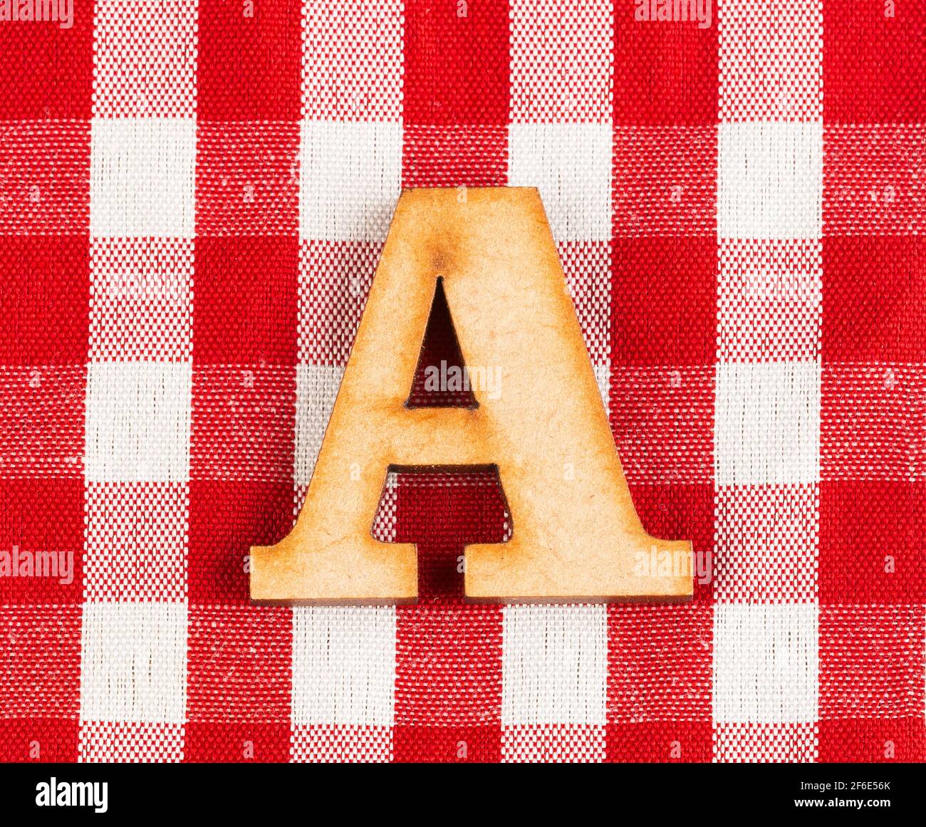 Letter A of the alphabet - Red checkered fabric tablecloth Stock Photo ...