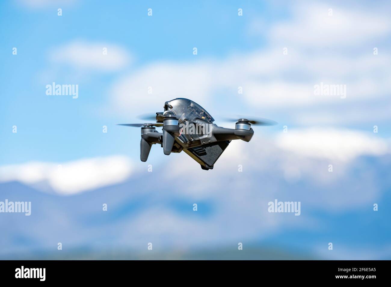 A new DJI FPV drone is flying during a sunny day. DJI FPV is a ...