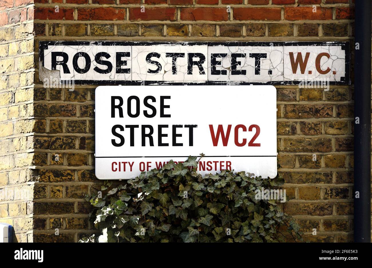 London, England, UK. Street sign: Rose Street, WC2, City of Westminster ...