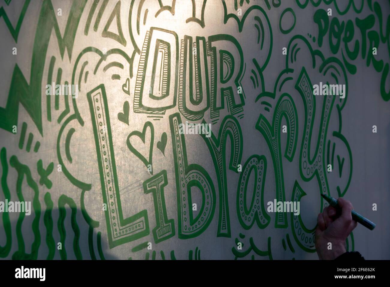 Muralist Luke Embden's Chipping Norton Library window artwork Stock ...