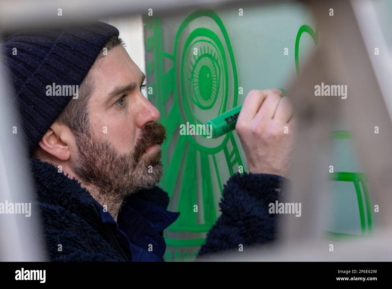 Muralist Luke Embden's Chipping Norton Library window artwork Stock ...