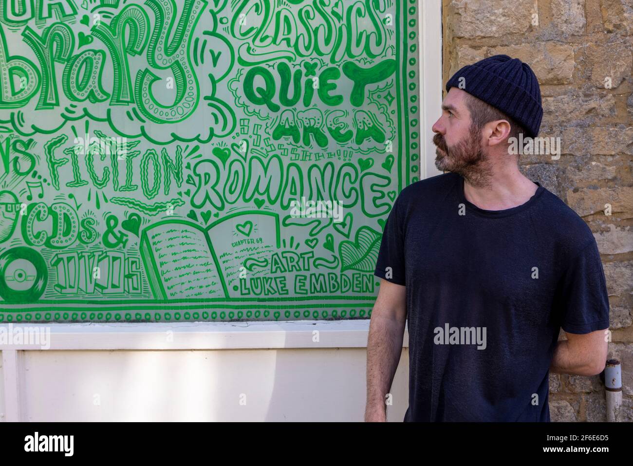 Muralist Luke Embden's Chipping Norton Library window artwork Stock ...