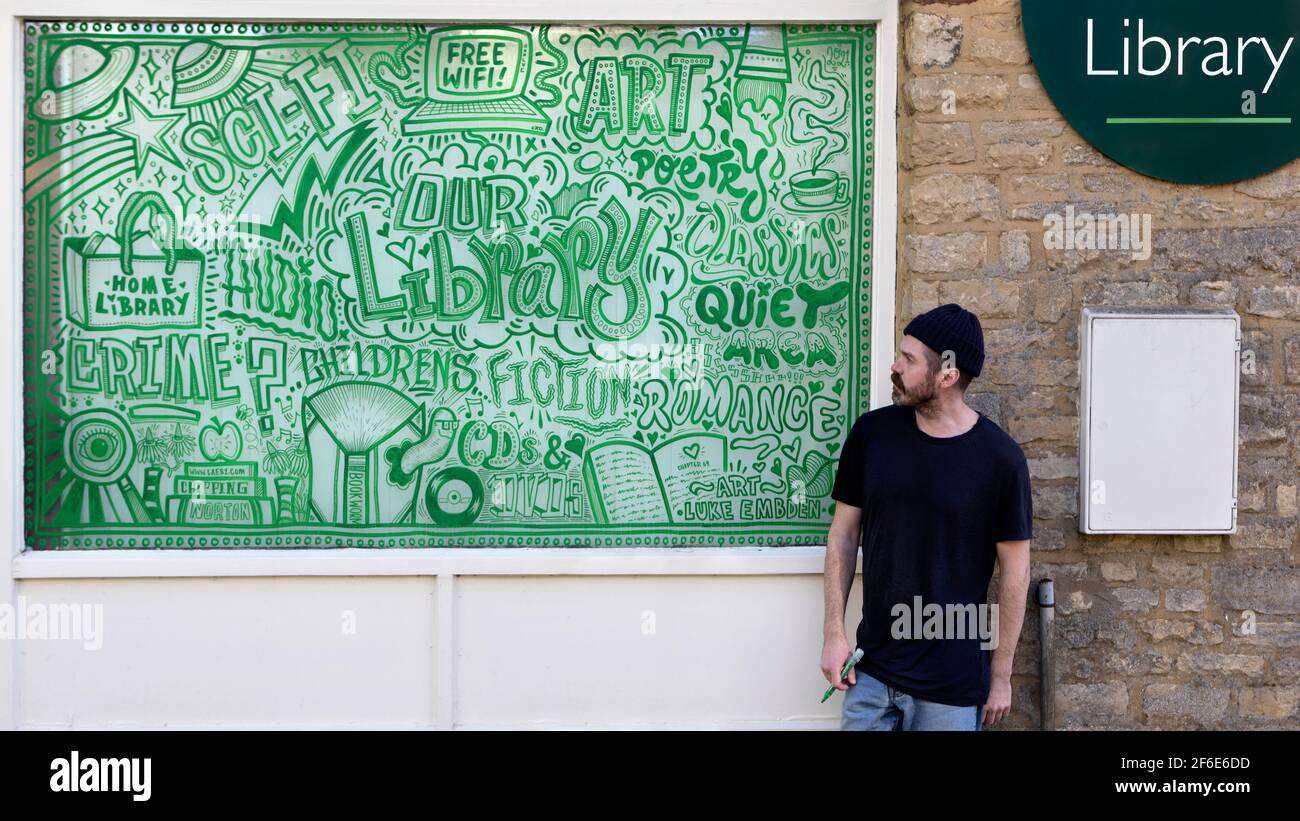 Muralist Luke Embden's Chipping Norton Library window artwork Stock ...