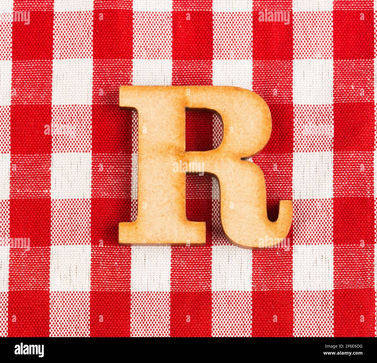 Letter R of the alphabet - Red checkered fabric tablecloth Stock Photo ...
