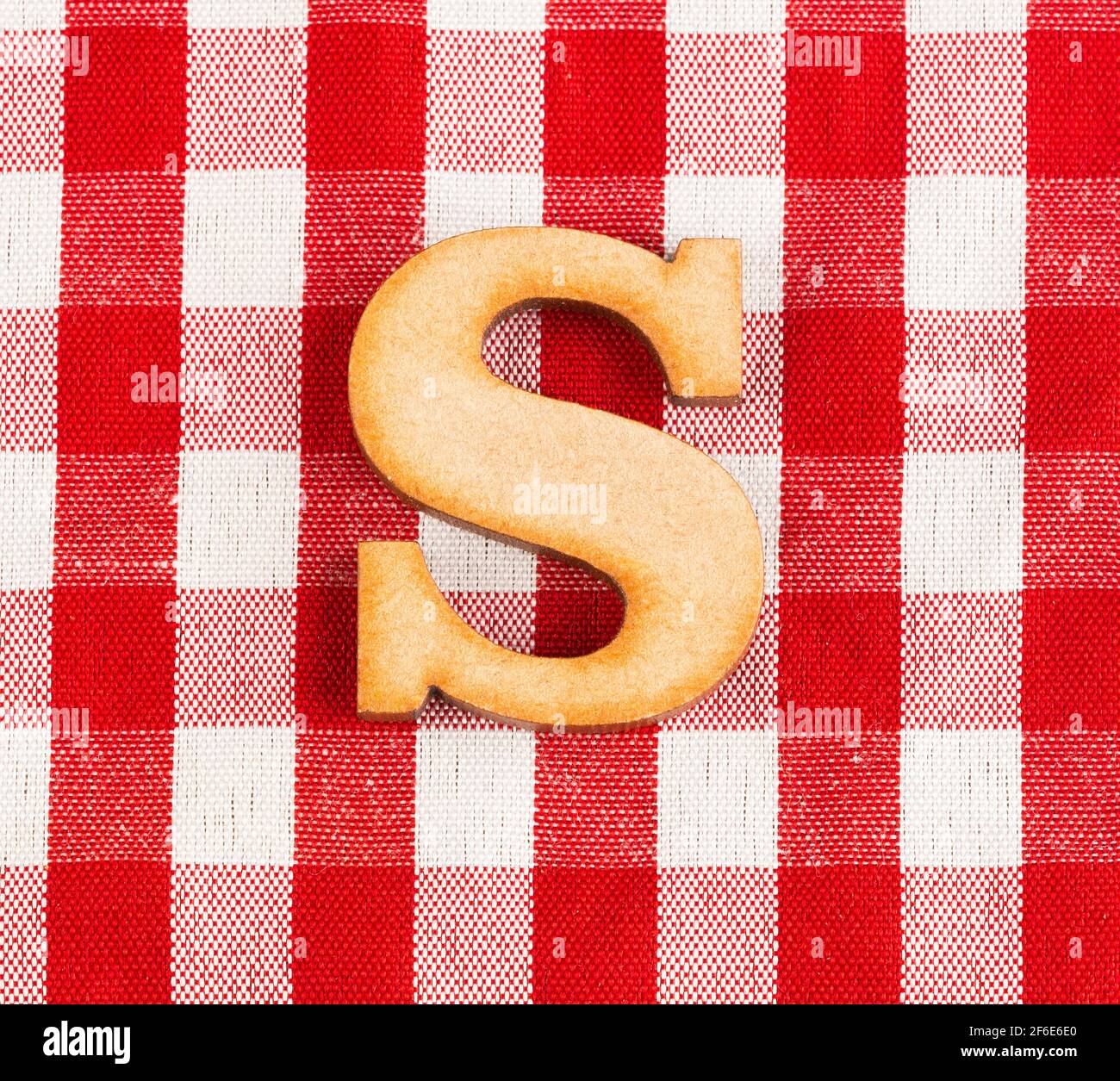 Letter S of the alphabet - Red checkered fabric tablecloth Stock Photo ...