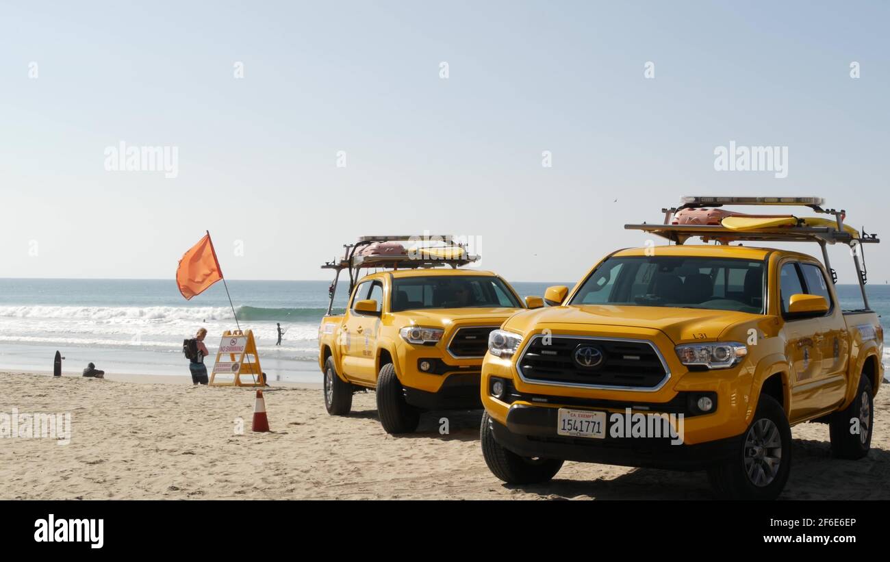 Oceanside, California USA - 8 Feb 2020: Yellow lifeguard car, beach ...
