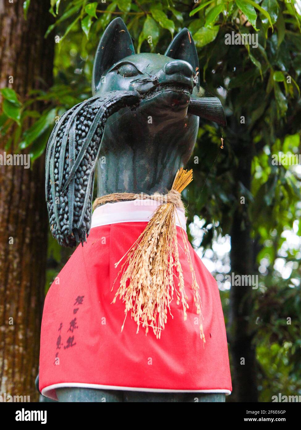 Detail of an animal (cat, dog?) sculpture at Fushimi Inari Shinto ...