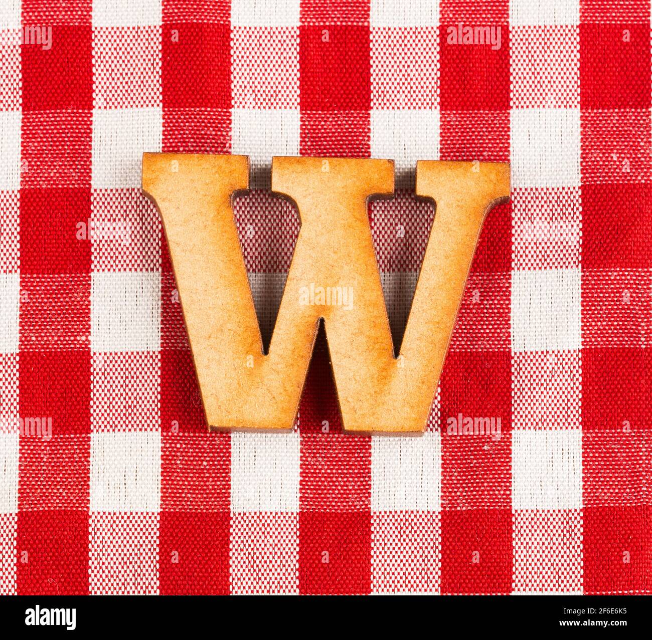 Letter W of the alphabet - Red checkered fabric tablecloth Stock Photo ...