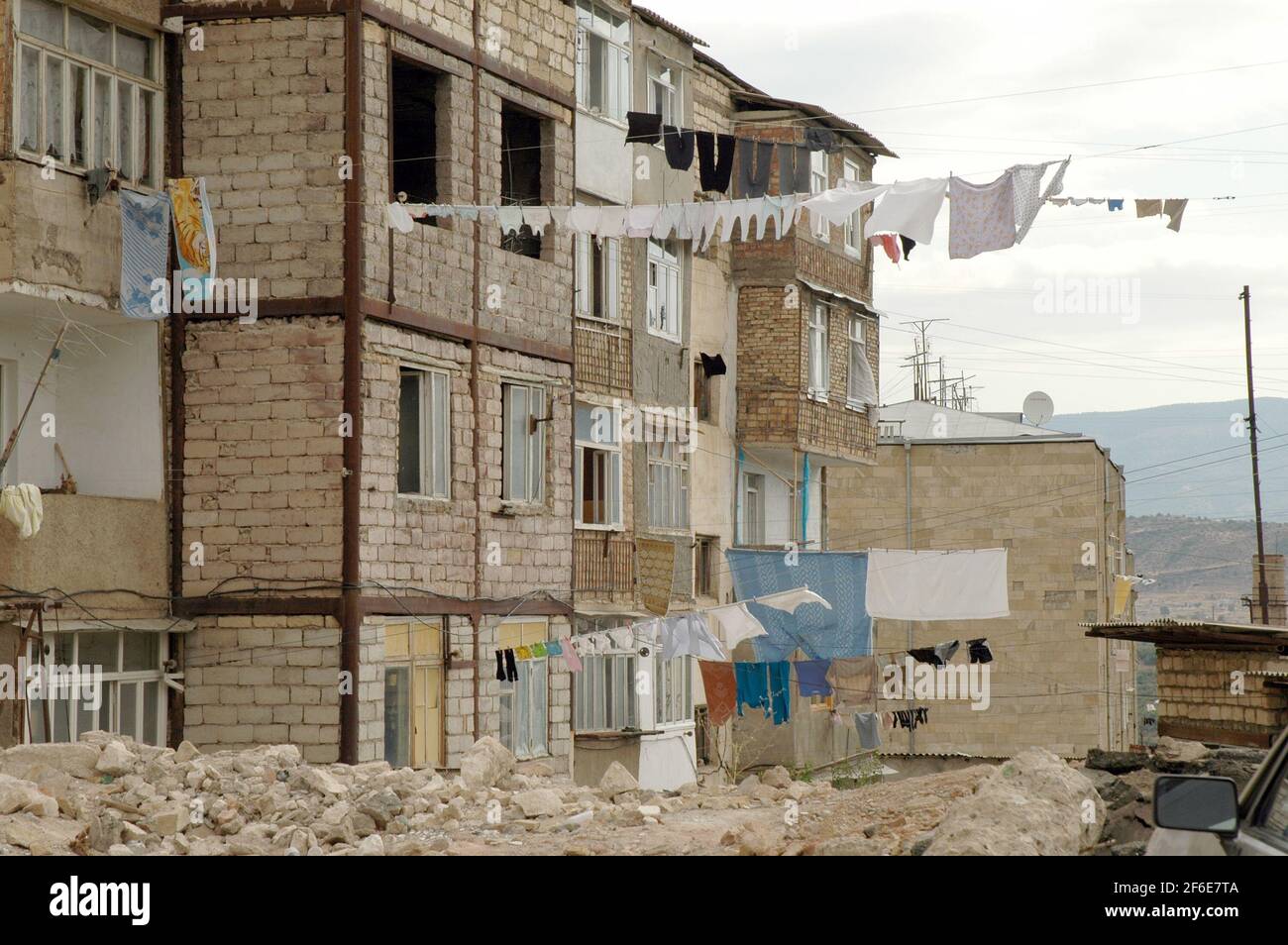 Deserted landscape with bombed houses in Nagorno Karabakh. Following ...