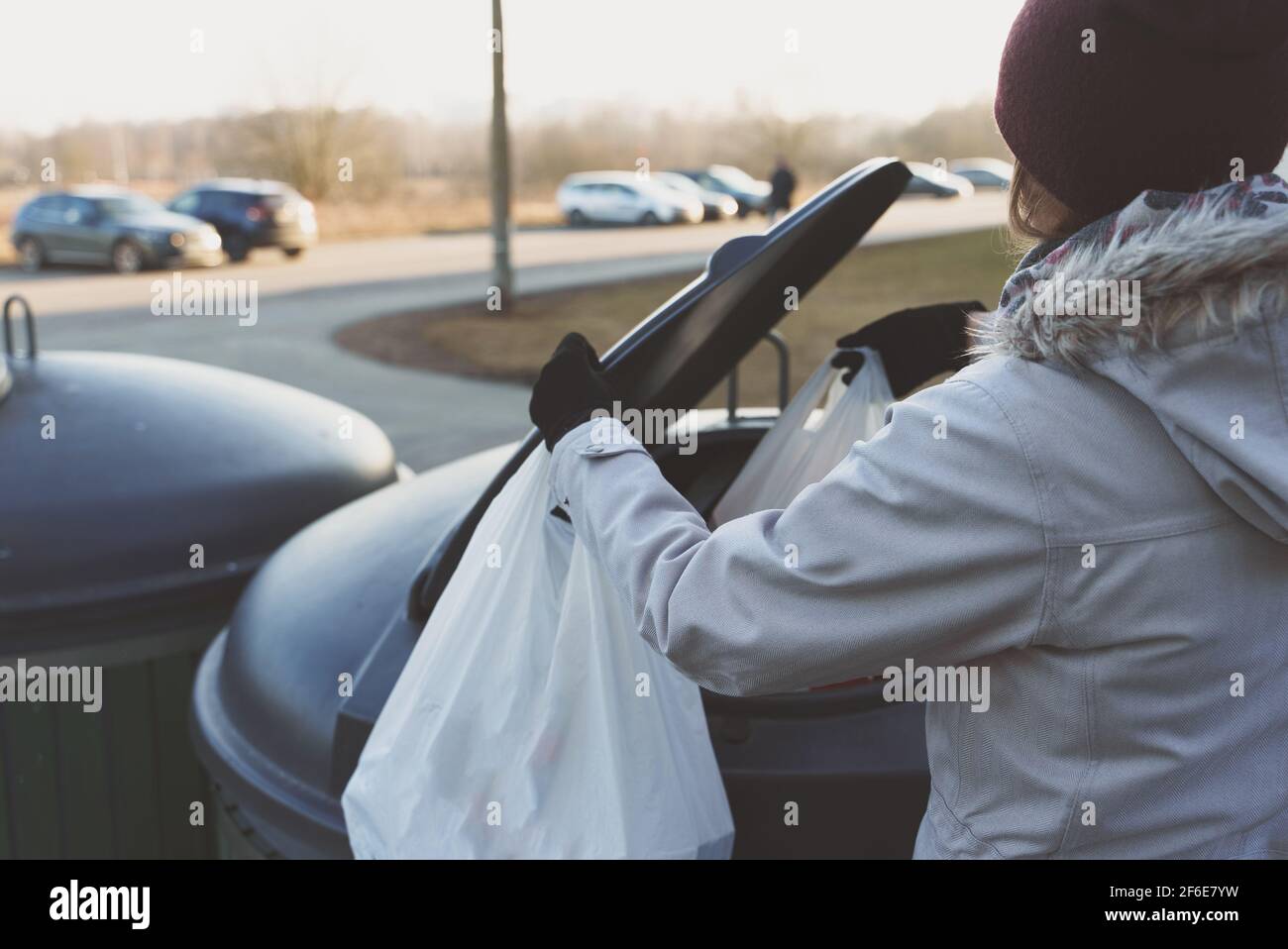 Woman on street throw away hi-res stock photography and images - Alamy