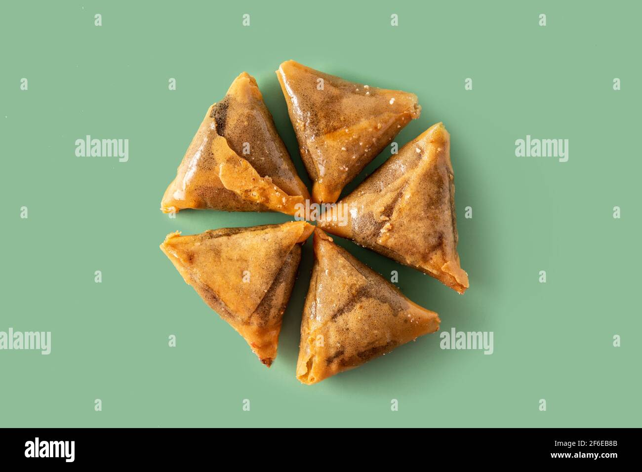 Traditional almond briwat on green background Stock Photo - Alamy