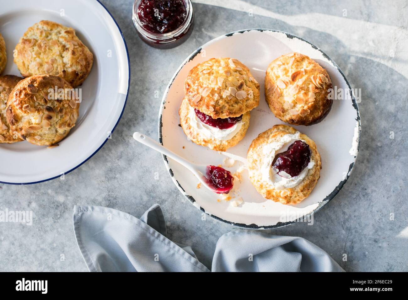 Traditional British Scones with clotted cream, raspberry jam Stock ...