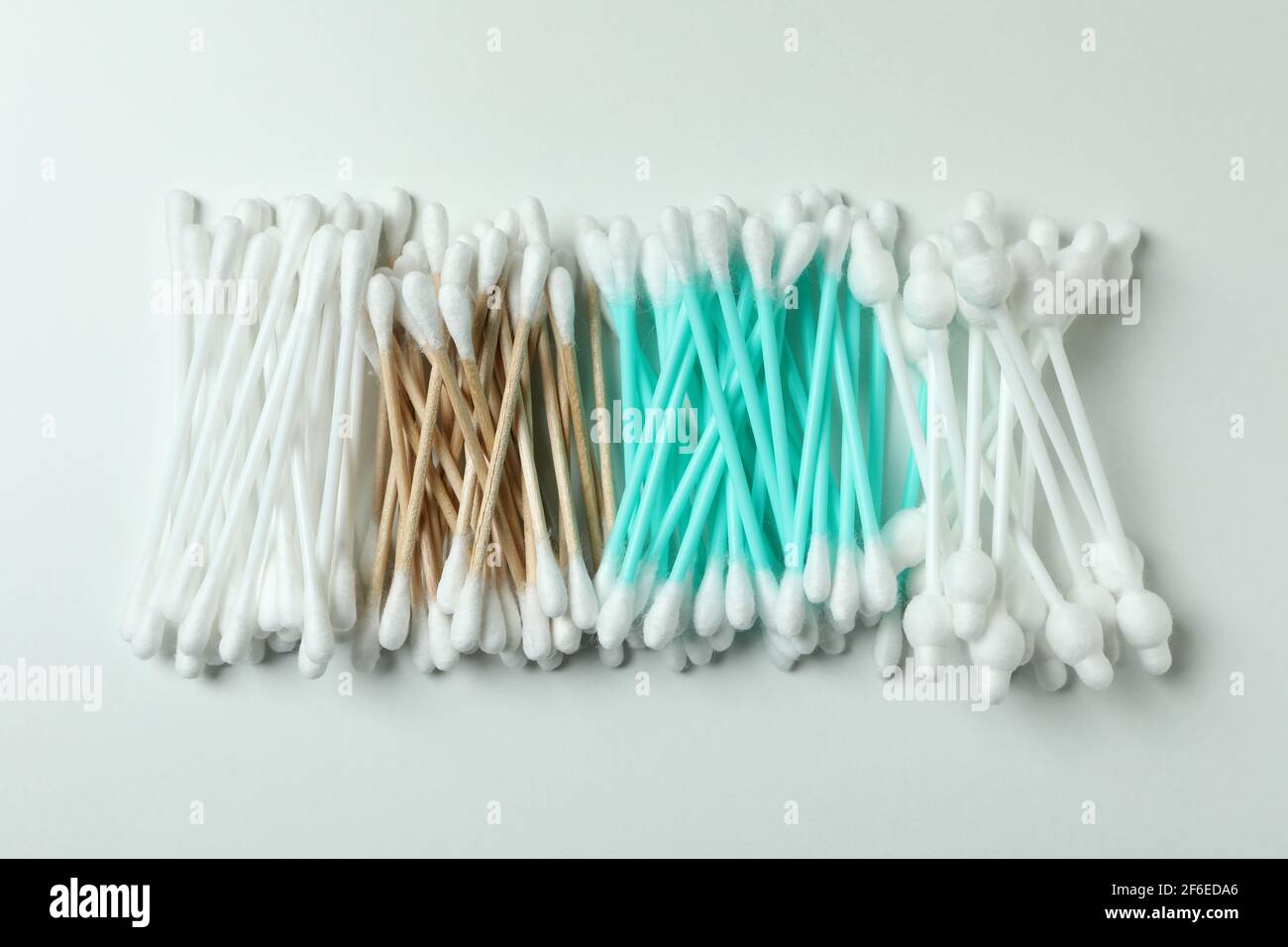 Different cotton swabs on white background, top view Stock Photo - Alamy