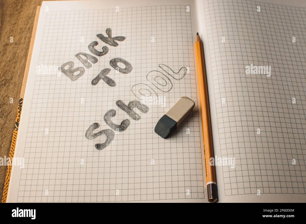 Children back to back writing hi-res stock photography and images - Alamy