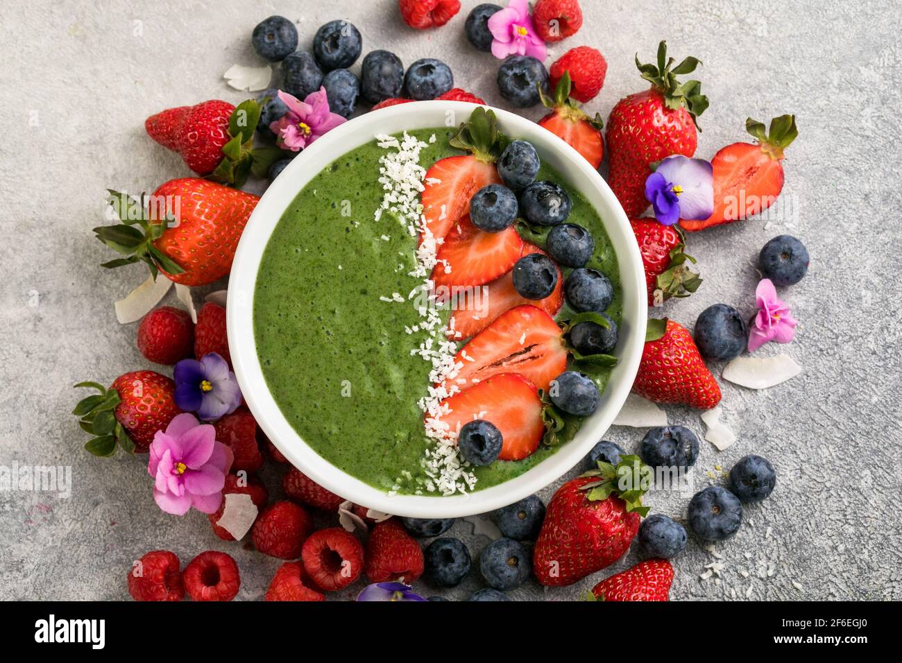 Matcha green tea breakfast superfoods smoothies bowl topped with ...