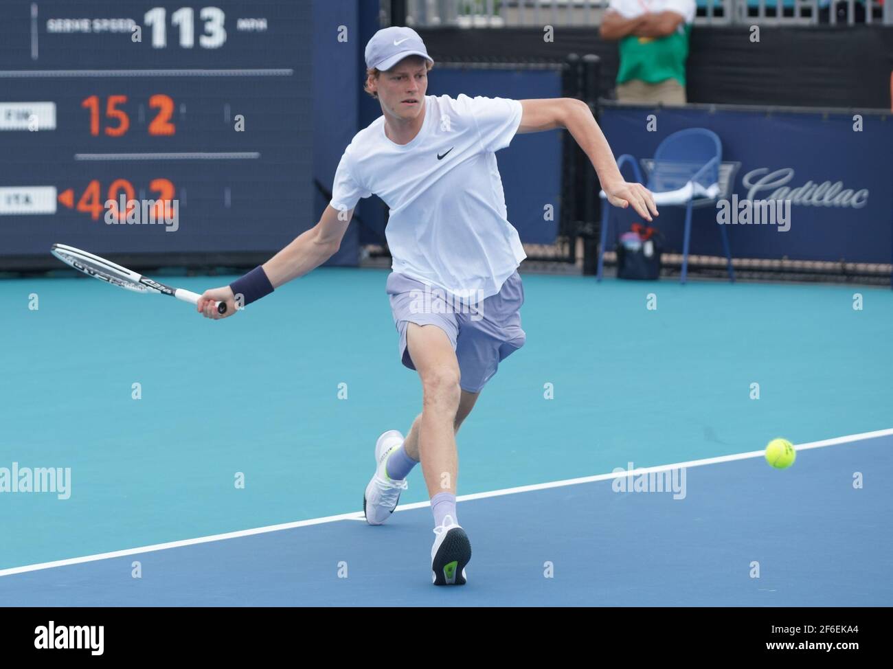 MIAMI GARDENS, FLORIDA - MARCH 30: Jannik Sinner of Italy returns a ...