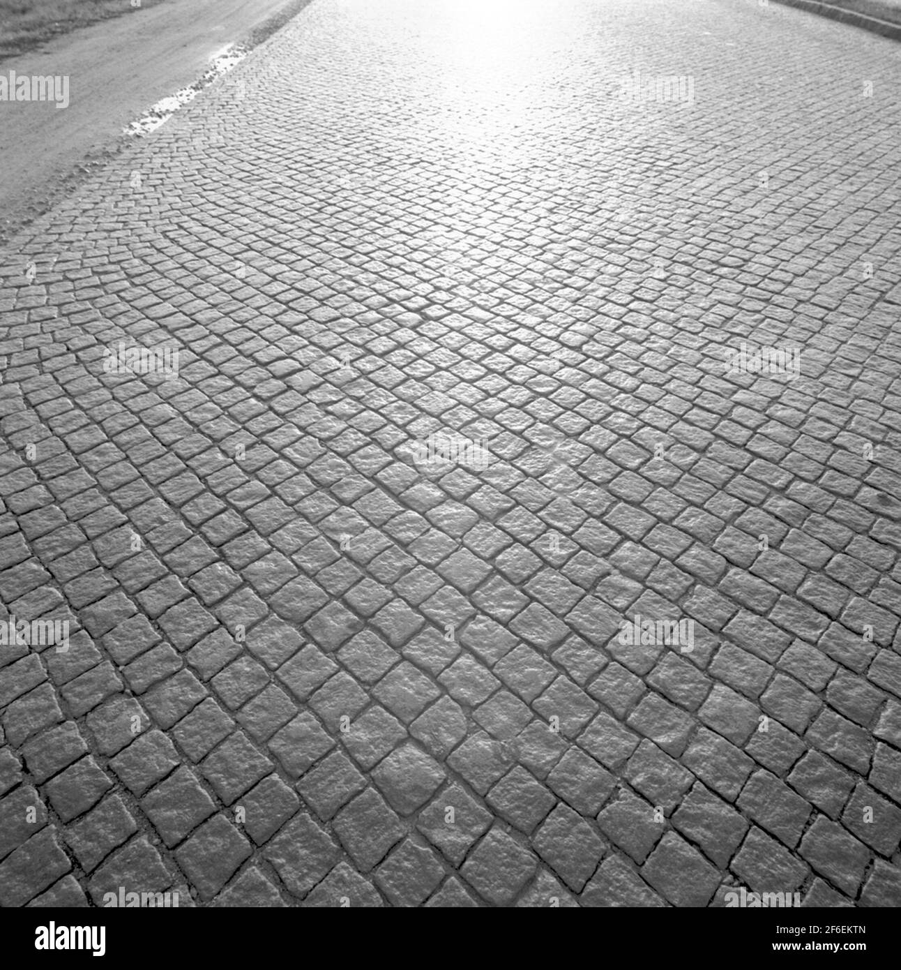 Paved street Black and White Stock Photos & Images - Alamy