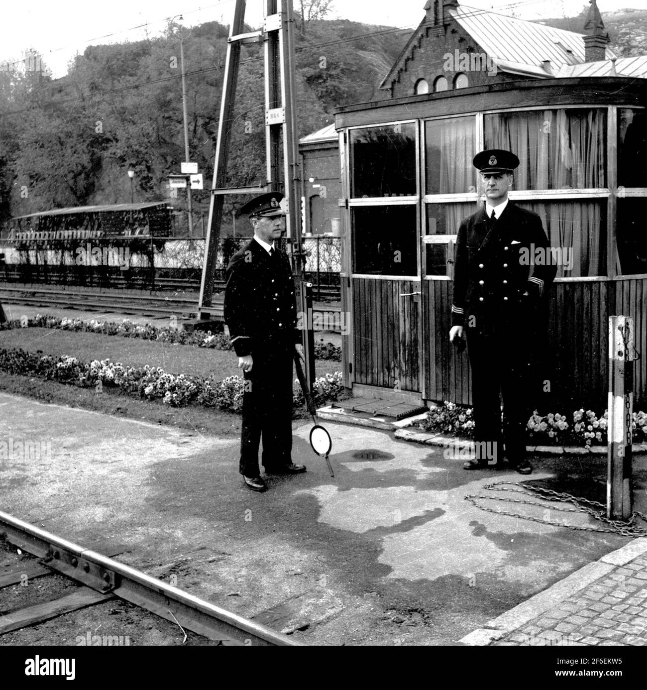 Station inspector Josef G. F. Karlsson (to the right) with station ...