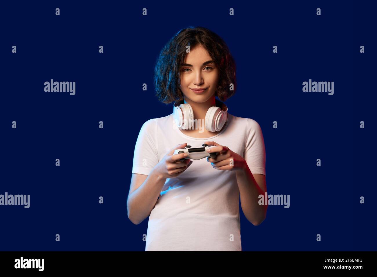 girl playing video games on the console Stock Photo - Alamy
