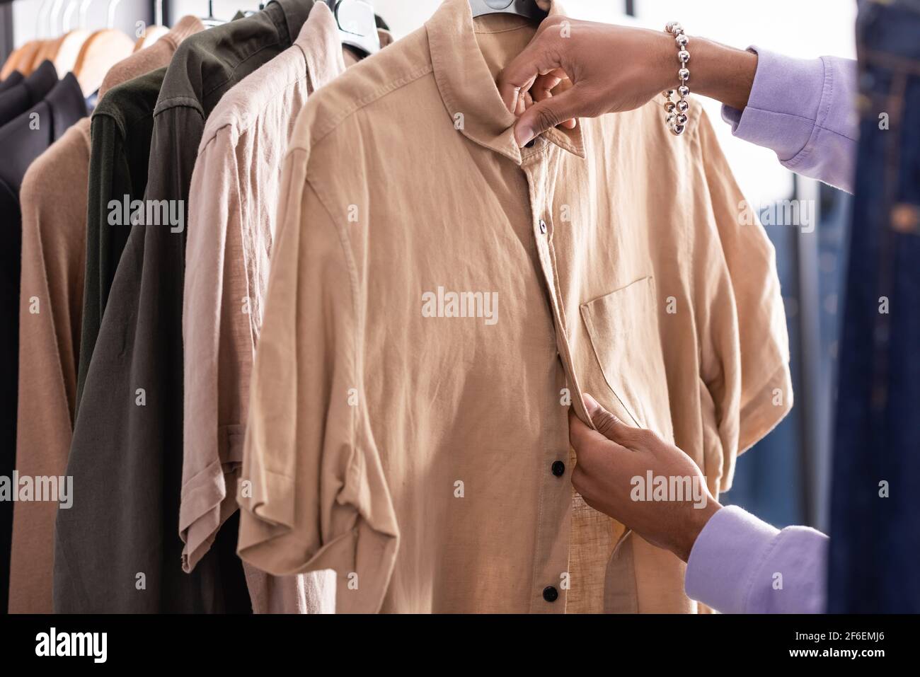 Fixing shirt hi-res stock photography and images - Alamy