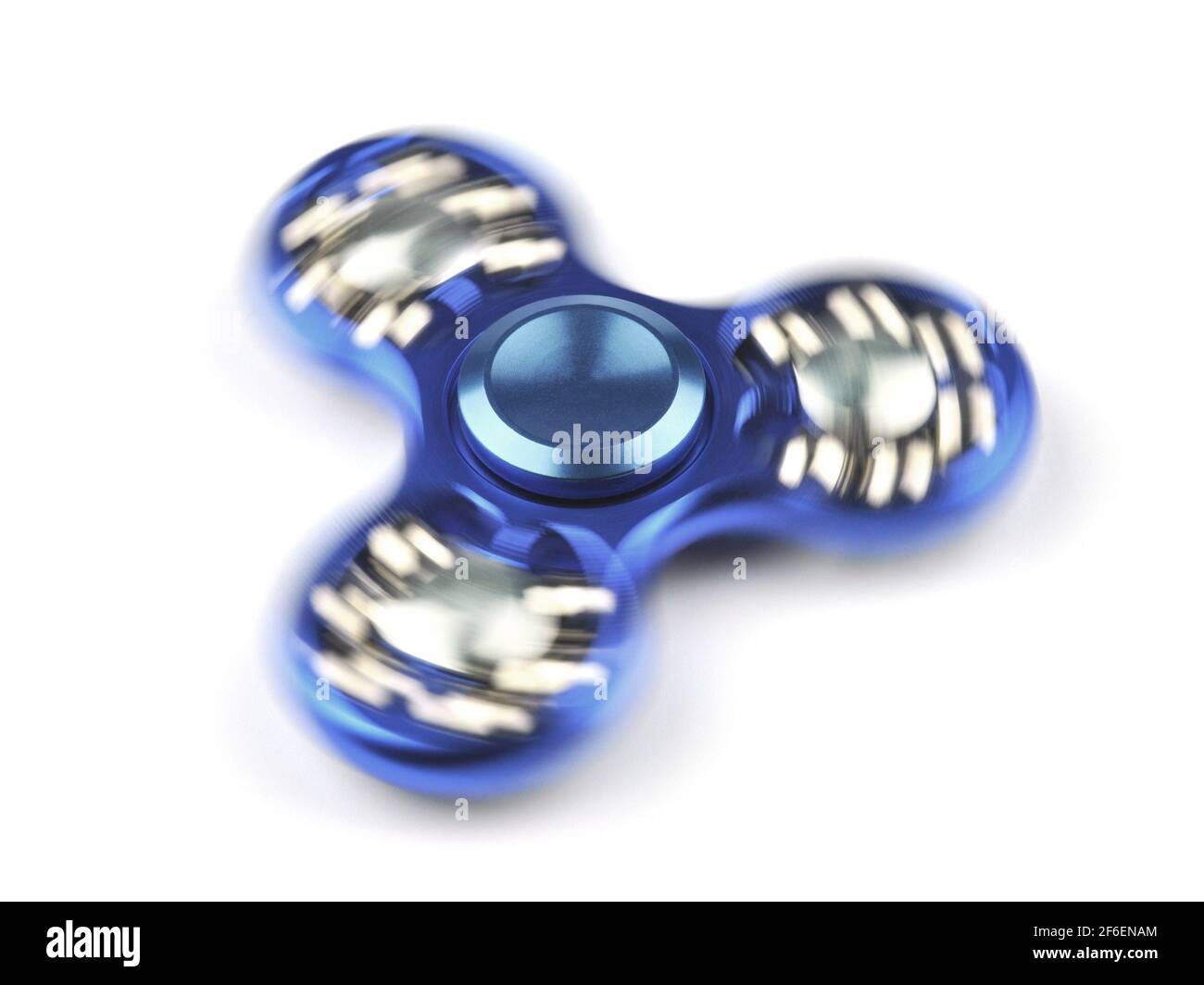 Rotating fidget spinner with small balls isolated on a white background ...
