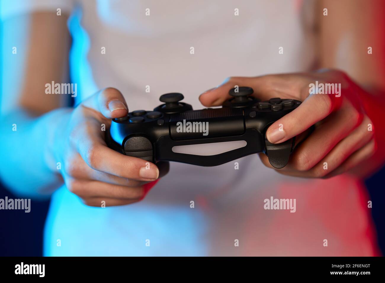 female hands playing video games on the console Stock Photo - Alamy