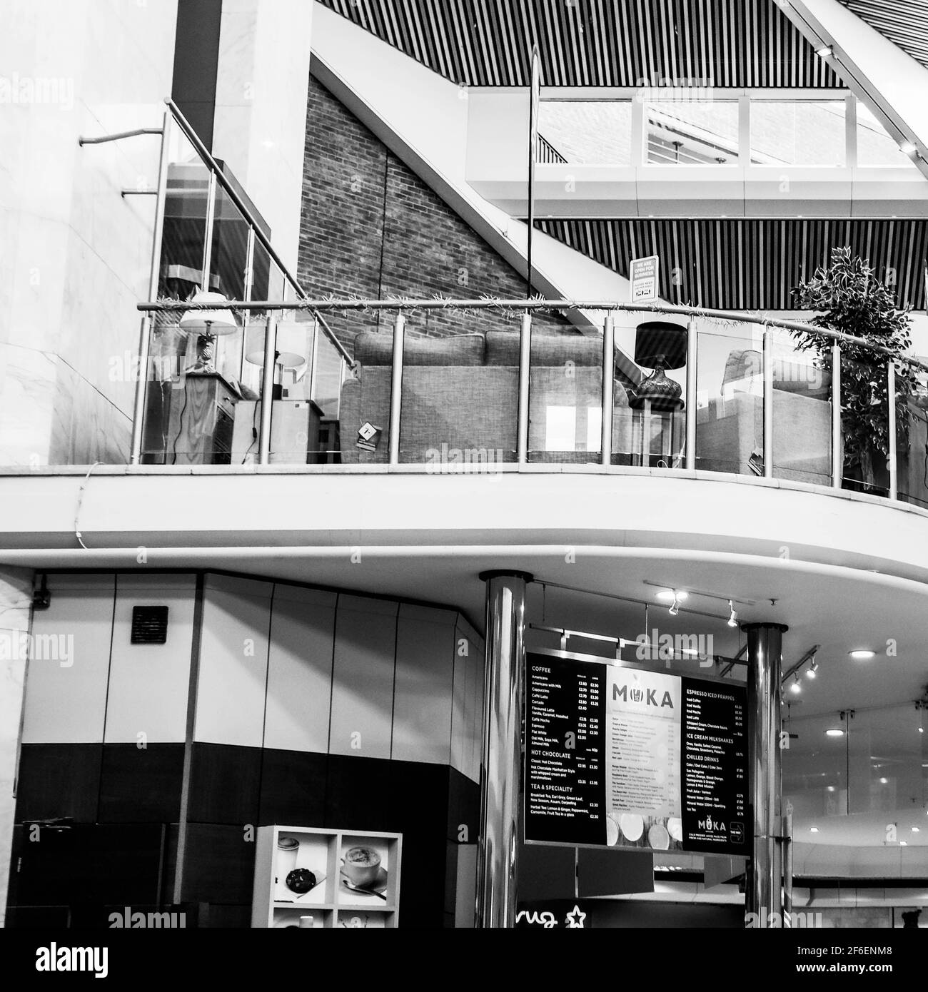 Black And White Image Of A Modern Interior Of A Shopping Mall In The UK ...