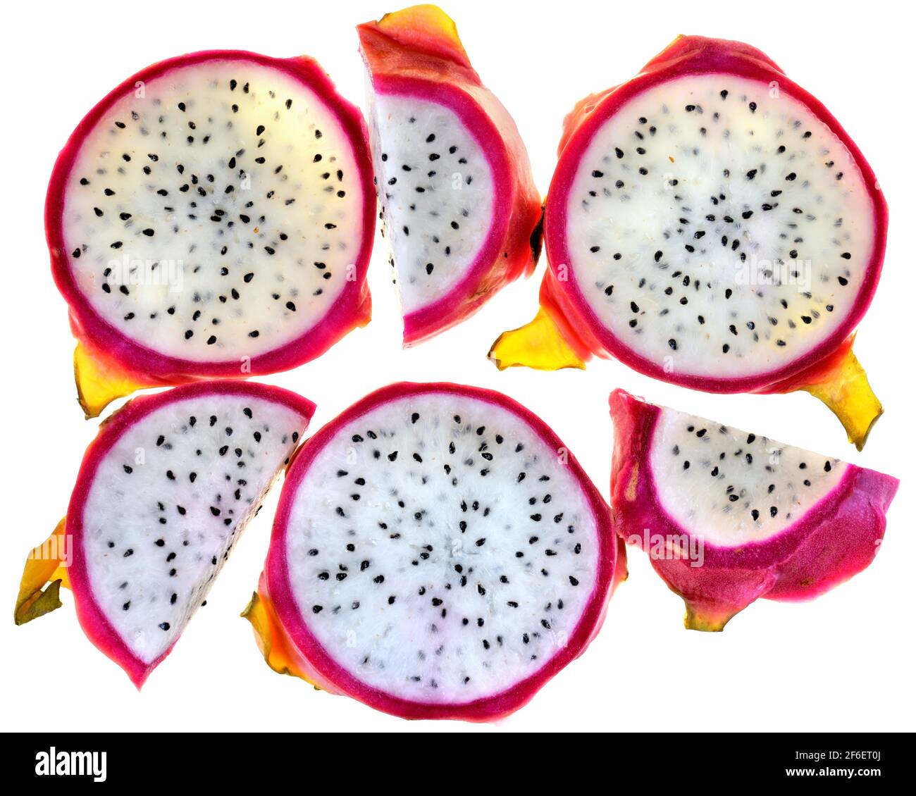 Sliced dragon fruit close-up top view isolated on a white background ...