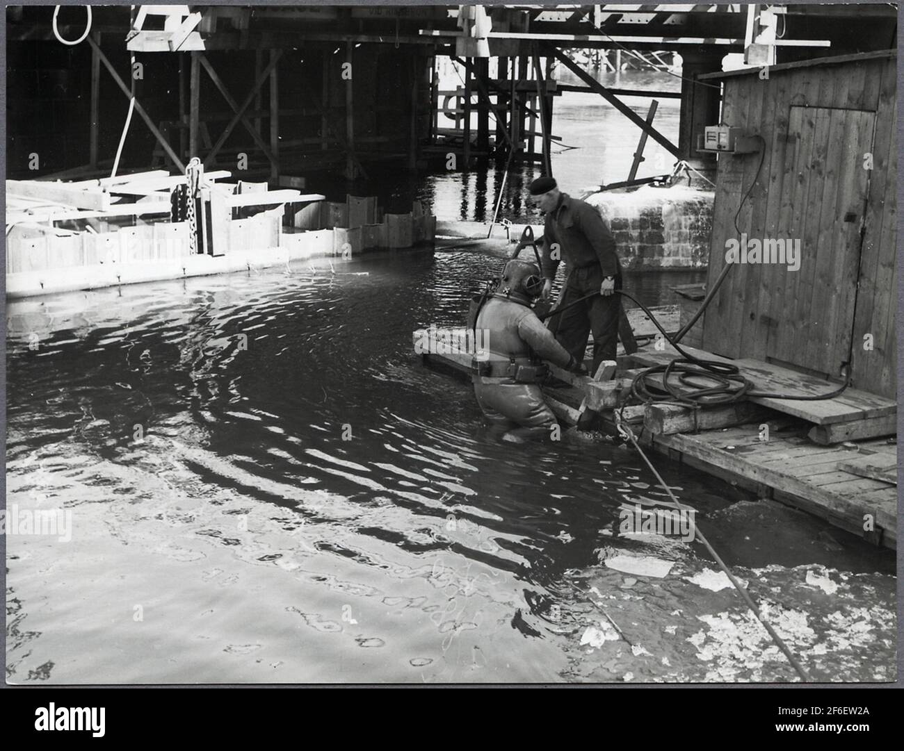 Bridge construction work. Divers perform work Stock Photo - Alamy