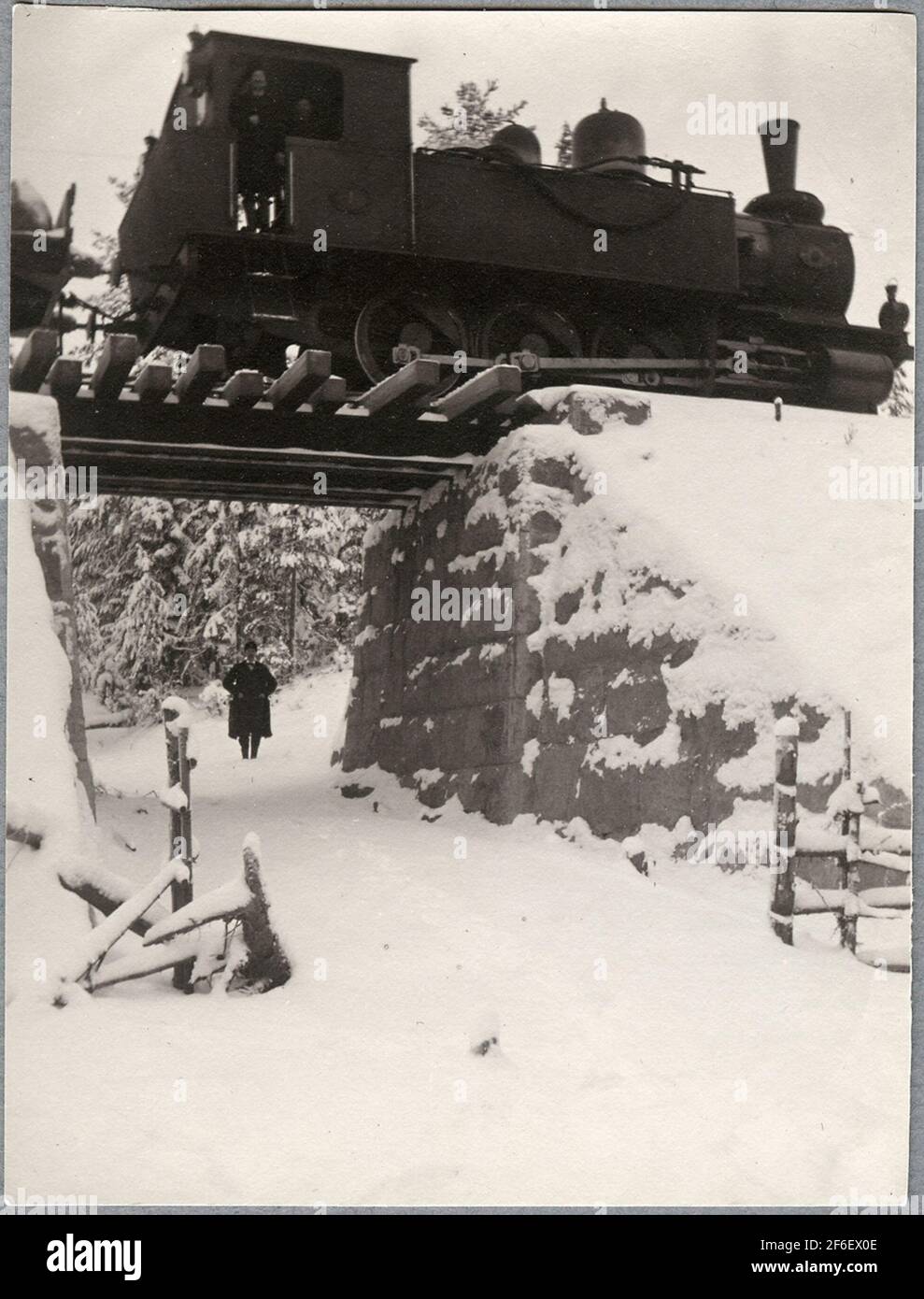 Steam locomotive passes bridge at kilometers 17 Stock Photo - Alamy