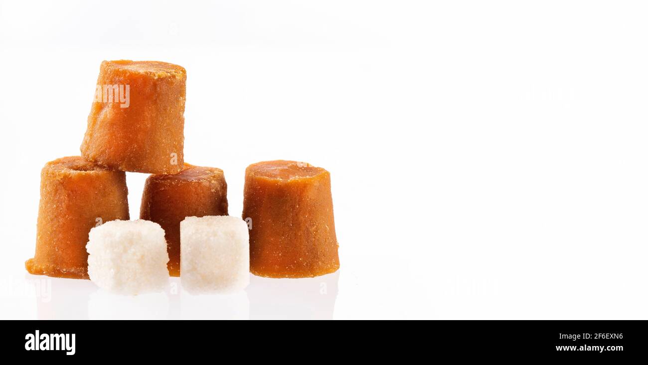 Sugar cane candy and refined sugar cubes - Saccharum officinarum Stock ...
