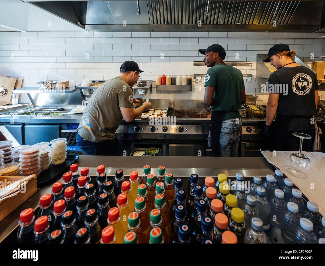 Male waiter with apron rear view hi-res stock photography and images ...