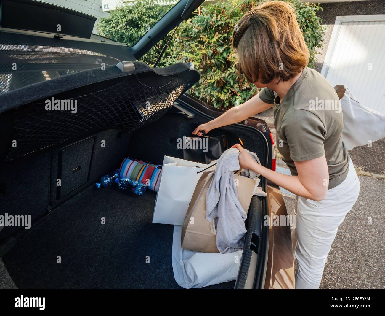 Car side view people bags hi-res stock photography and images - Alamy
