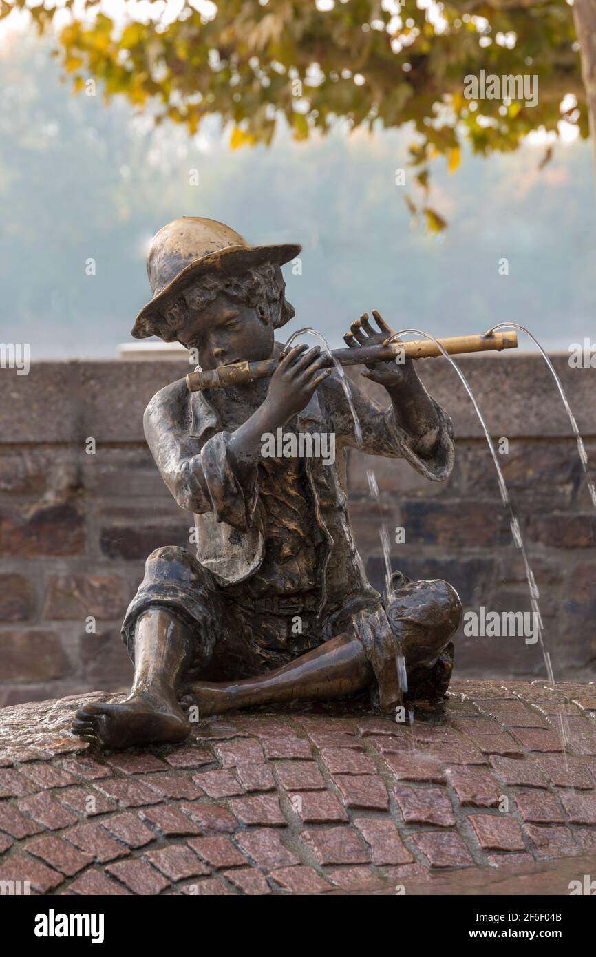 Flute player as a fountain Stock Photo - Alamy