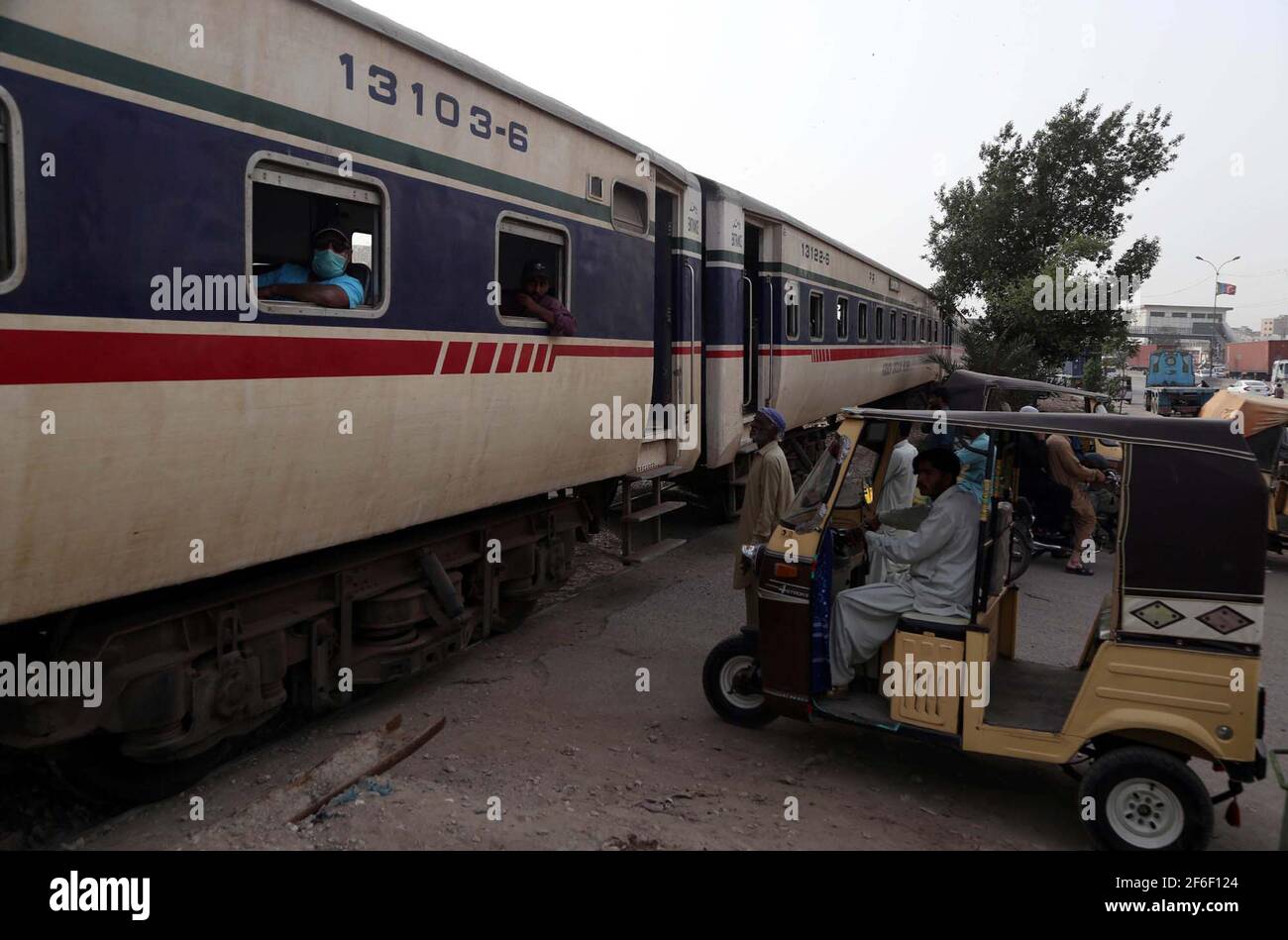 Karachi Circular Railway (KCR) Train on its way while commuters ...