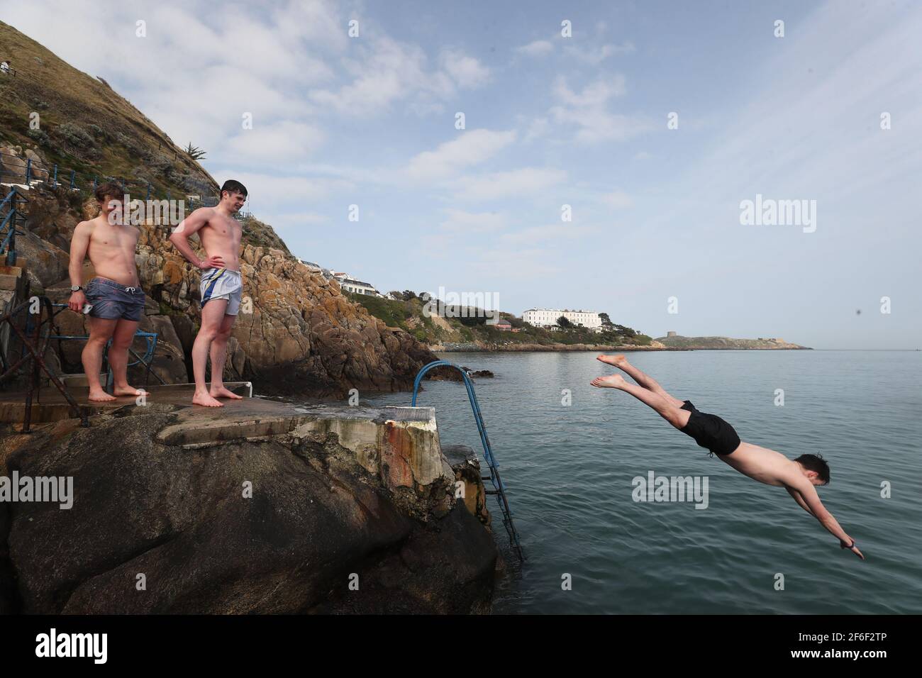Brendan McCarthy dives into the sea at the Vico bathing place, Hawk ...