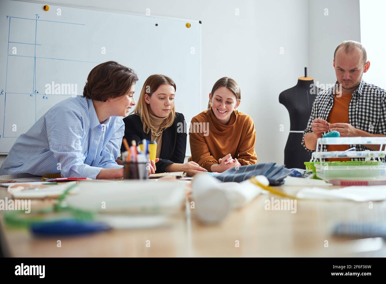 Colleagues getting together teamwork hi-res stock photography and ...