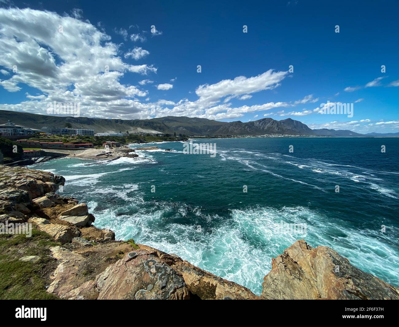 Panoramic view cityscape of Hermanus and Walker Bay seen from cliff ...