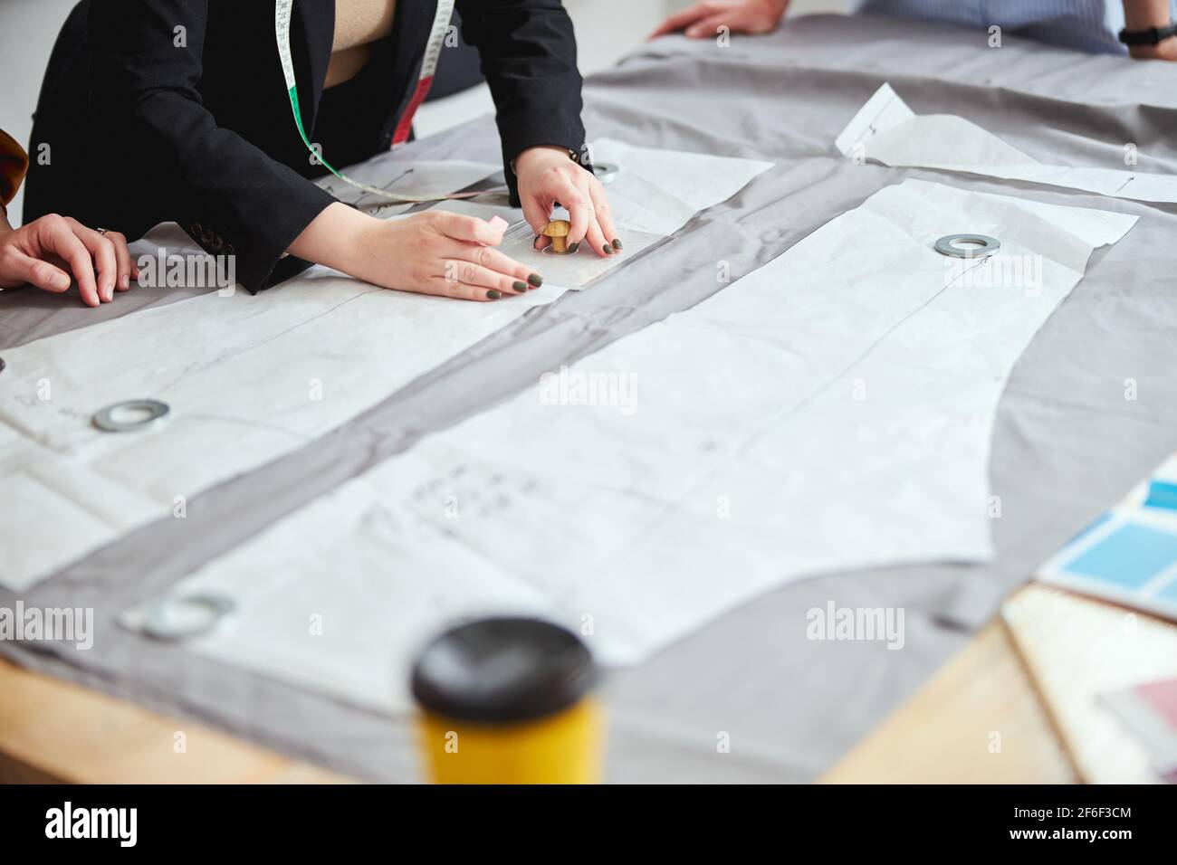 Large piece of sewing pattern in tailoring establishment Stock Photo ...