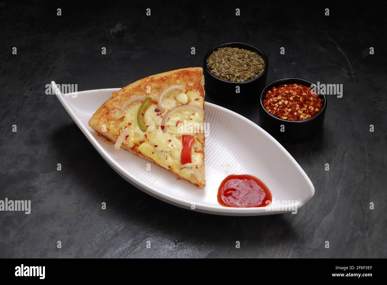 Pizza 3 layered cheese pizza, made using red ,green and yellow bell ...