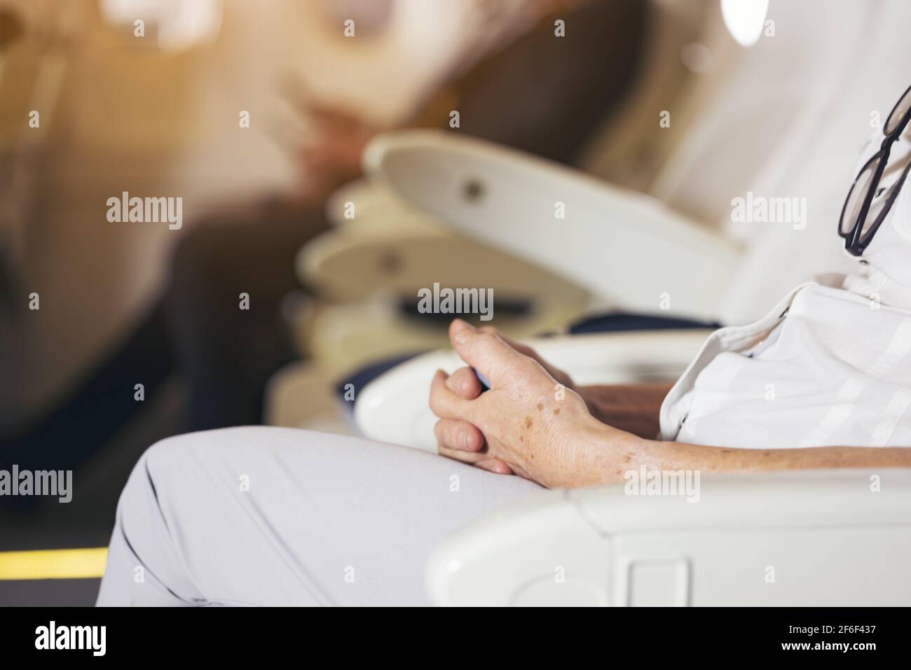 Airplane passenger hand hi-res stock photography and images - Alamy