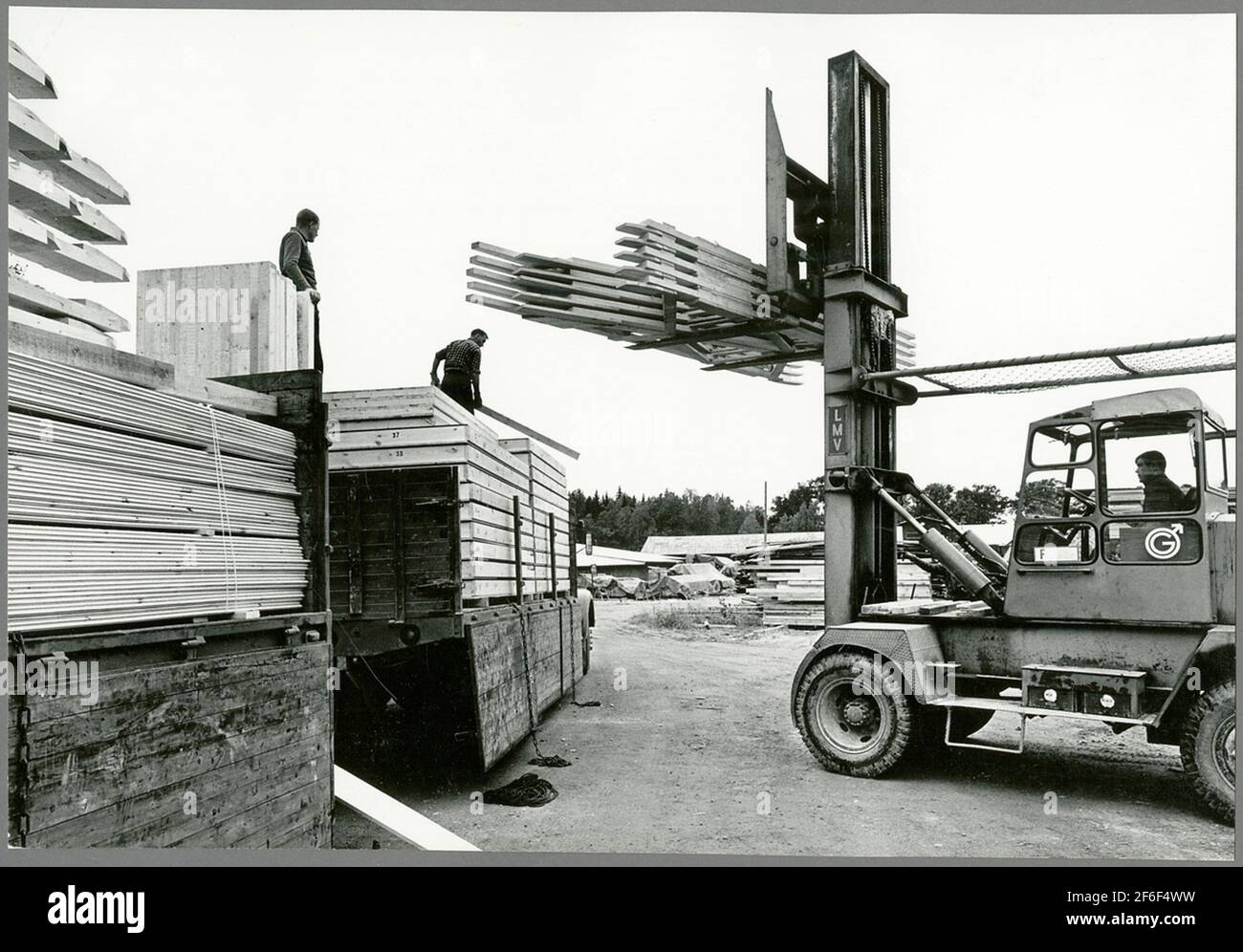 Loading wood material Stock Photo - Alamy