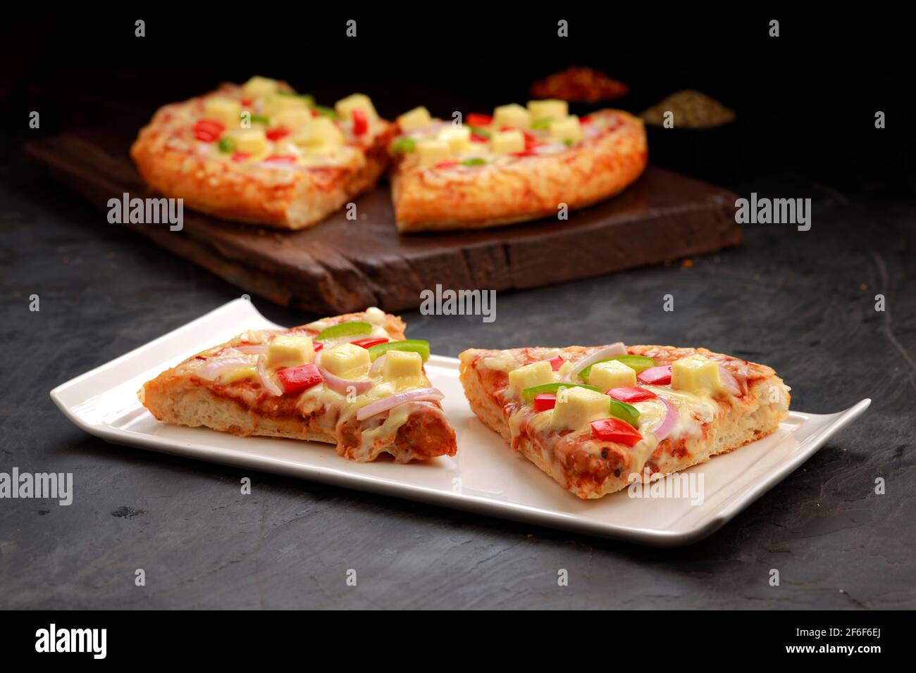 Pizza Paneer Makhani , made using red and green bell pepper ,onion ...