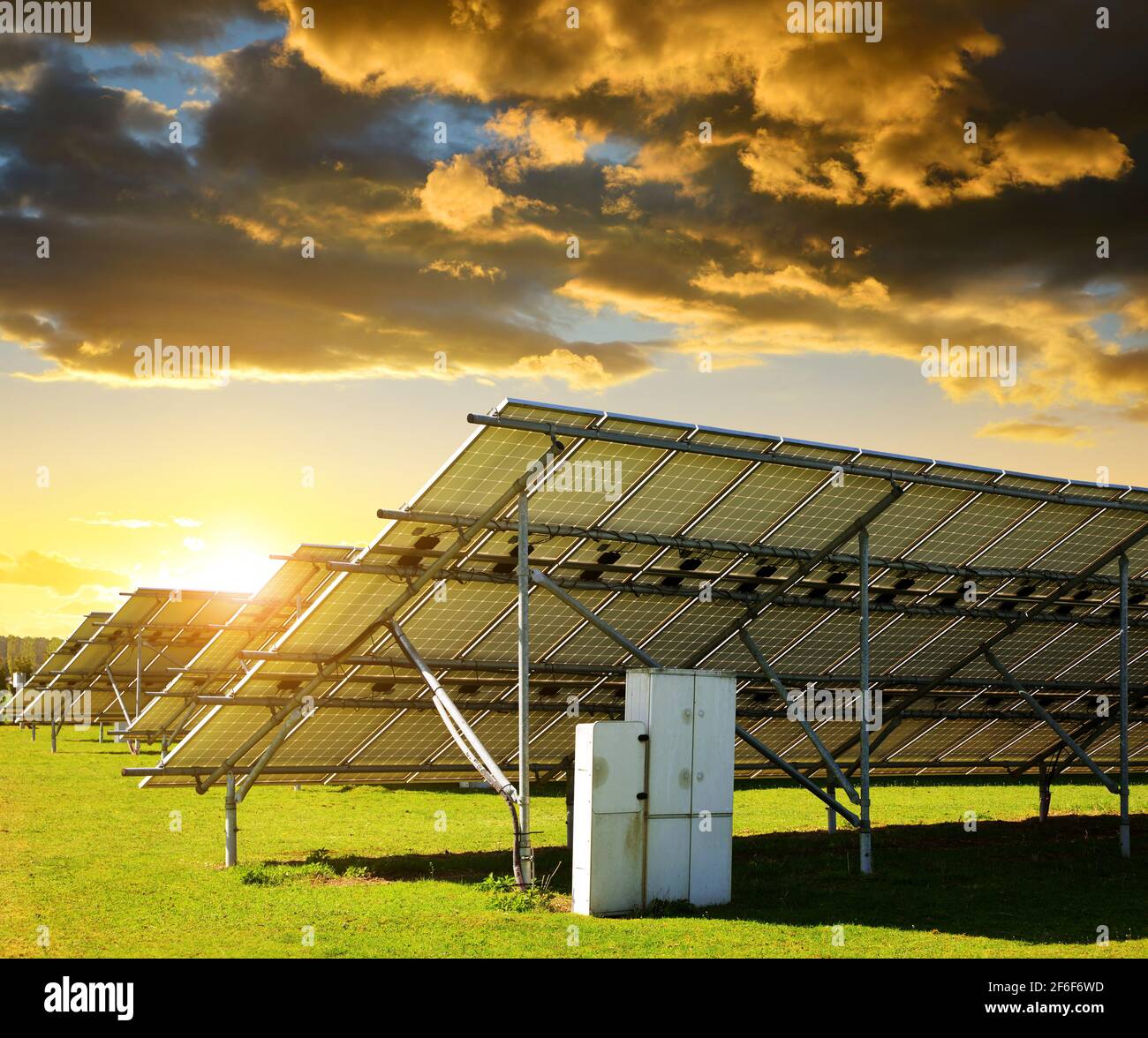 Solar energy panels in the meadow at sunset.Sustainable resources Stock ...