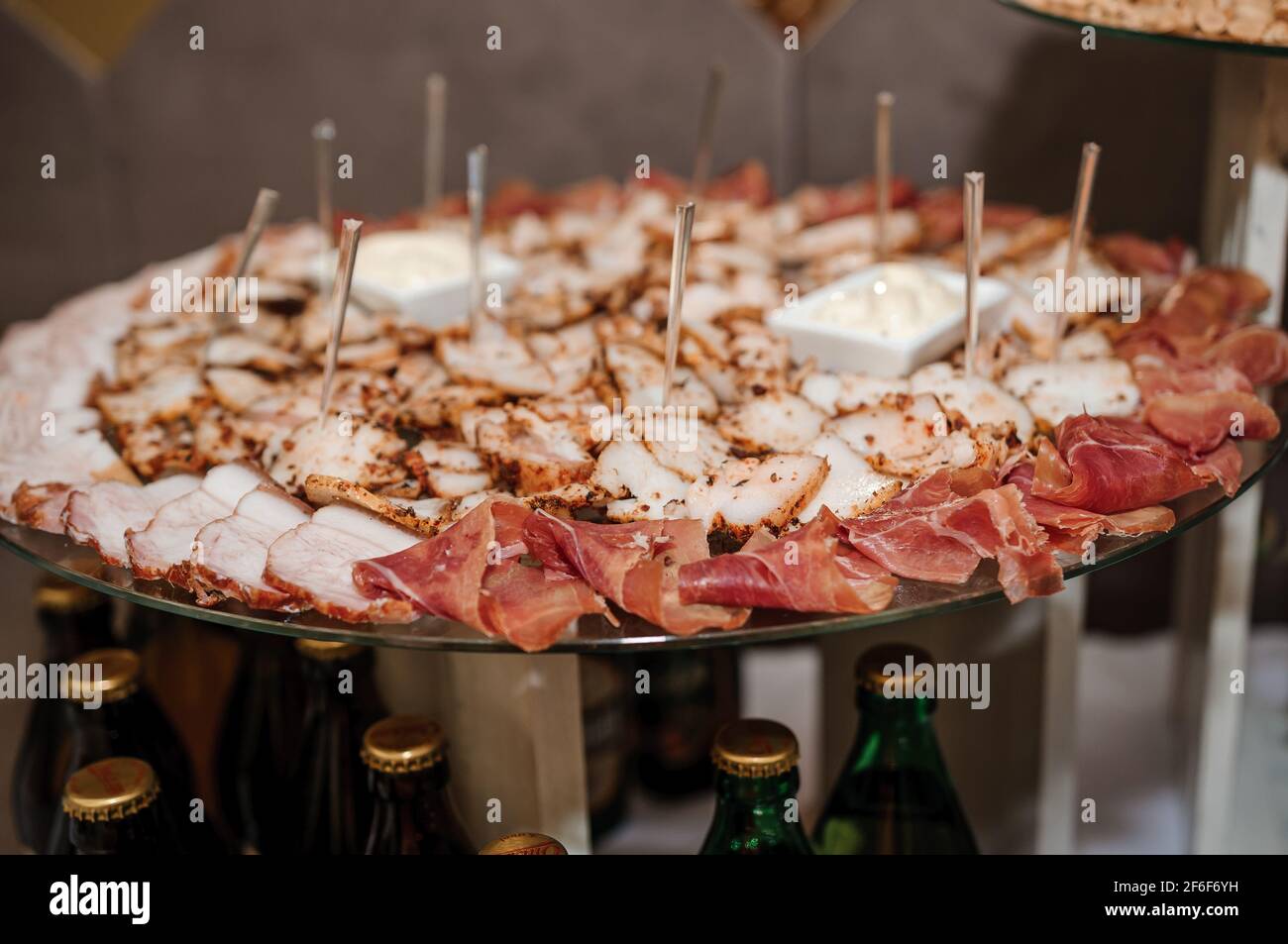 Slicing different types of meat. Wedding buffet Stock Photo - Alamy