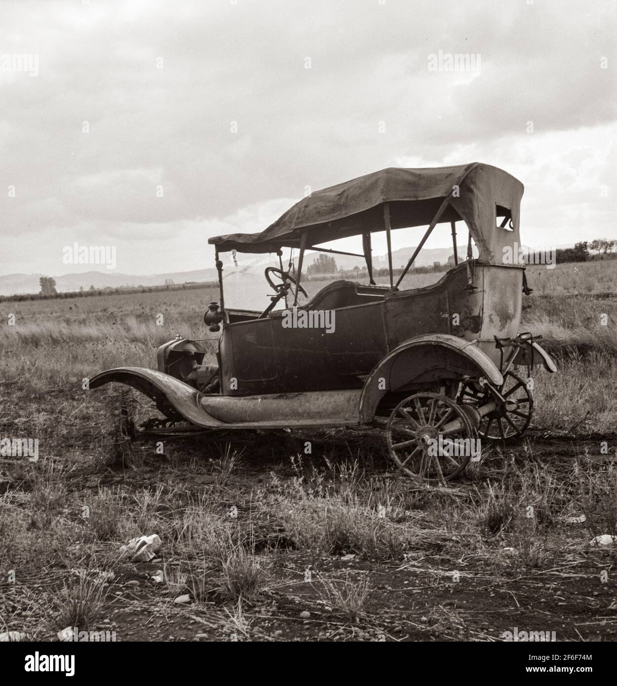 The end of the Ford Model "T" abandoned in open field along Highway 99 ...