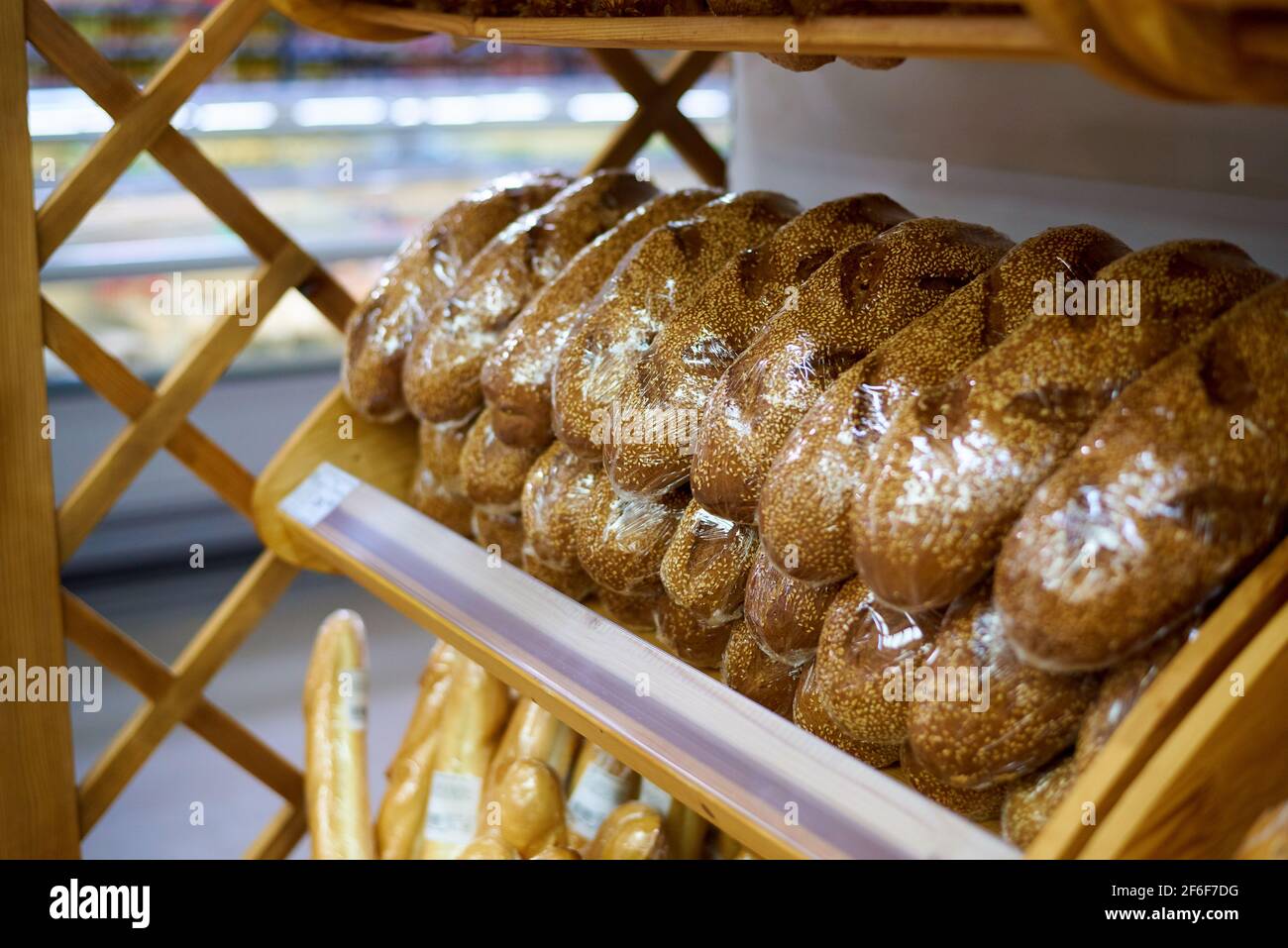 Bread products on the shelf in the store close-up Stock Photo - Alamy