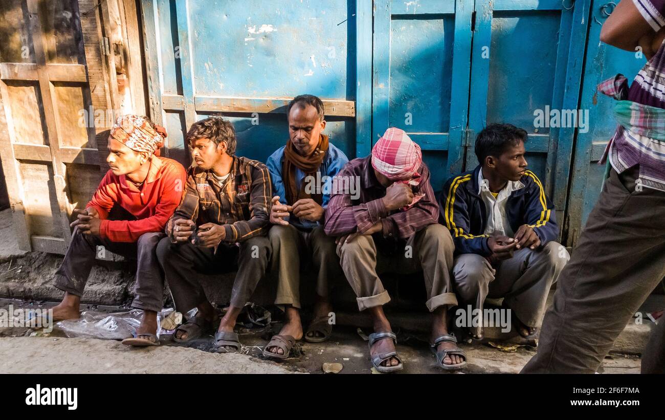 Kolkata, West Bengal, India - January 2018: Indian labourers sitting ...